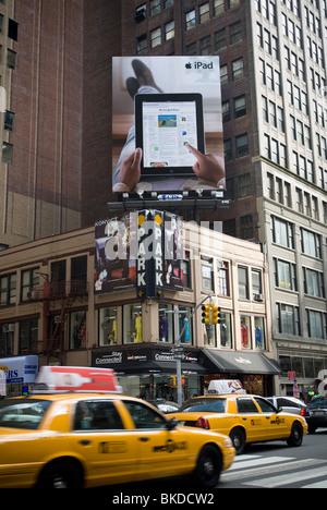 Apple iPhone and iPad advertising billboard on 6th Ave, New York city ...