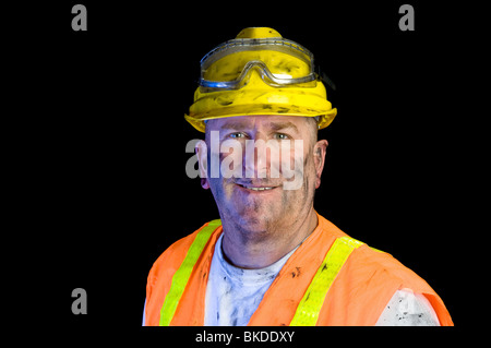 A dirty, grungy, greasy utility construction worker with hard hat Stock ...