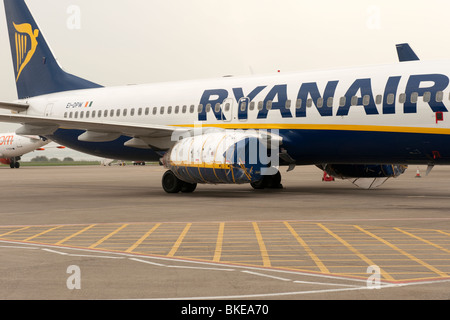 Ryanair plane with engine covered up in plastic to protect from ...