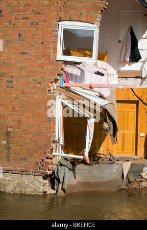 House collapsed into river after flooding of the river Corve in Ludlow ...