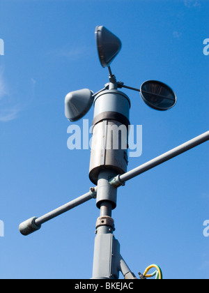Wind-monitoring meteorological mast (met mast) with data logger being ...