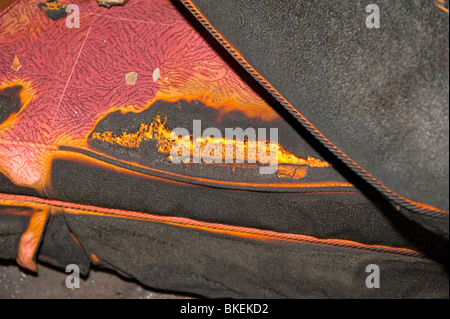 Burn pattern on domestic sofa following use of accelerant petrol to ...