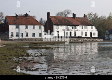 The Royal Oak public house and Langstone Mill on the shoreline at the ...