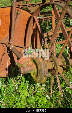 rusty farm machinery in corner of field Stock Photo - Alamy