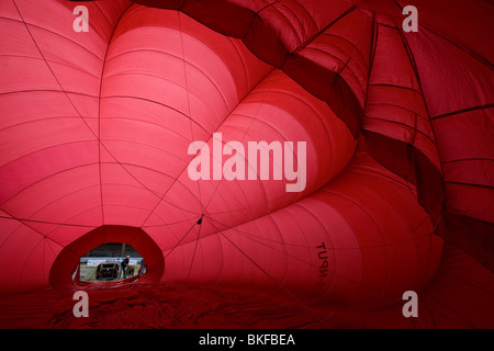 Hot air balloon during inflation Stock Photo - Alamy
