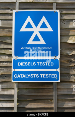 Blue and white signs for MOT vehicle testing station, catalysts tested ...