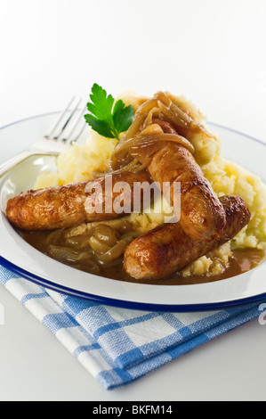 Bangers and mash traditional british dish of pork sausage with onion ...