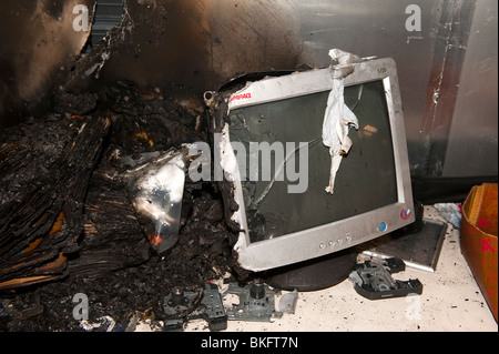 Burnt melted computer screen after fire Stock Photo - Alamy