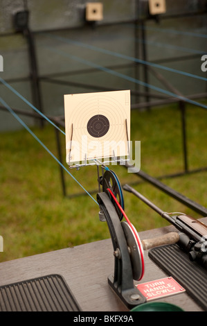 gun air rifle Shooting range gallery at funfair fair fairground with bb ...