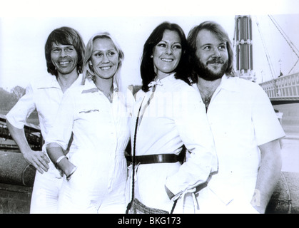 Anni-Frid Lyngstad, Benny Andersson sitting in a sofa, smoking and listening to records in Bjorn ...