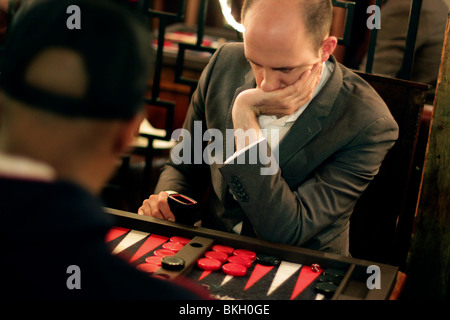 men playing backgammon in a bar Stock Photo - Alamy