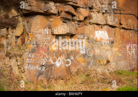 Graffiti on Sandstone cliff face Stock Photo - Alamy