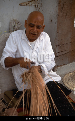 Bahrain Handicrafts On Street Man Making Basket Stock Photo - Alamy