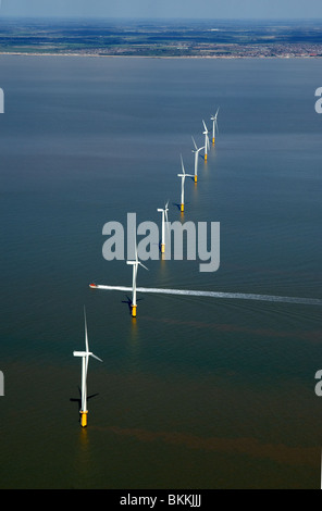 Wind turbines offshore on Gunfleet Sands seen from Clacton on Sea an ...