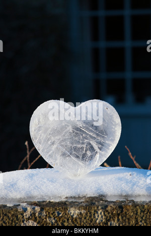 Heart frozen in a block of ice: cold-hearted Stock Photo - Alamy