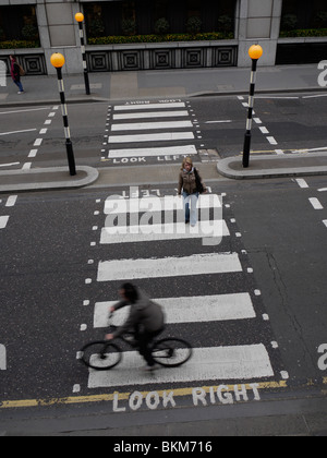 Zebra crossing Pelican crossing with traffic cyclist and pedestrians ...
