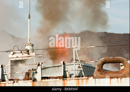 Ex Navy Ship on fire in dock with large volumes of smoke coming from ...