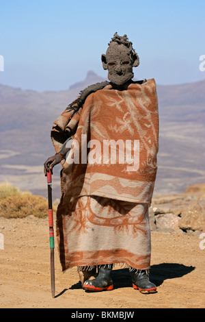 A Basotho shepherd in the traditional blanket up in the highlands of ...