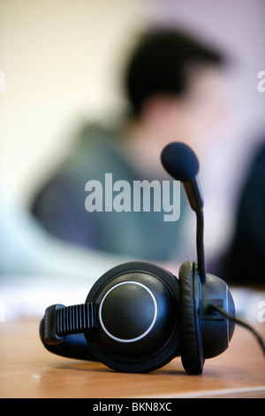 Headphones in a language lab at a university Stock Photo - Alamy