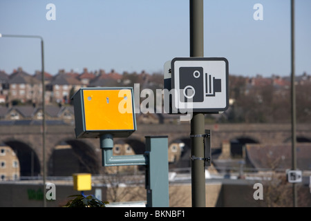 yellow speed traffic cameras and warning signs on a road in Buxton ...