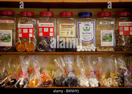Different sweets on shelf at candy shop Stock Photo - Alamy