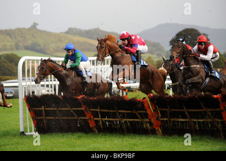 Horse racing over hurdles at Ludlow Race Course in Shropshire Uk Stock ...