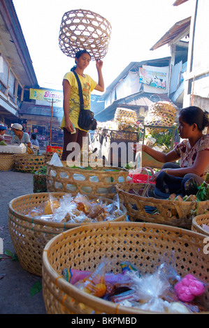 Young Balinese woman working at the Ubud Markets Bali Indonesia Stock ...
