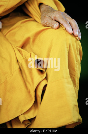 Old Buddhist monk resting in Chaukhtatgyi Buddha Temple, Yangon ...
