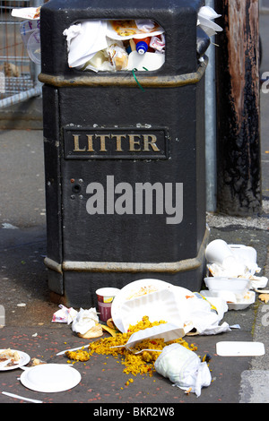 waste overflowing bin full of fast food packaging litter Stock Photo ...
