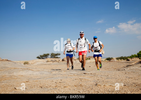 Namibia, Namib Desert, runners compete in the Namibia Ultra Marathon ...