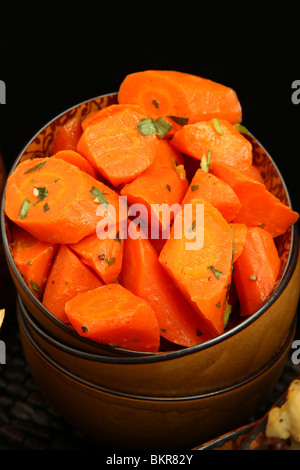 Bowl of homemade honey baked carrots Stock Photo - Alamy