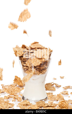 pour oat milk in glass on wood background with copy space, wide photo ...
