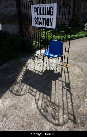 A sign directs voters to a polling station to cast their ballots in the ...