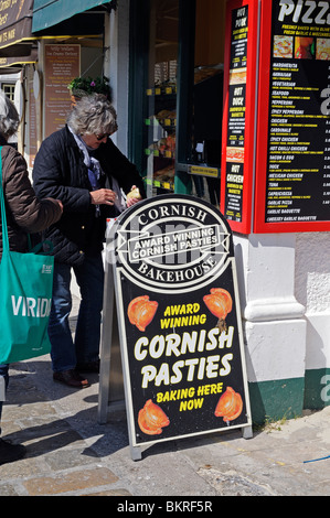 Cornish pasty shop St Ives Cornwall UK tourists looking through Stock ...