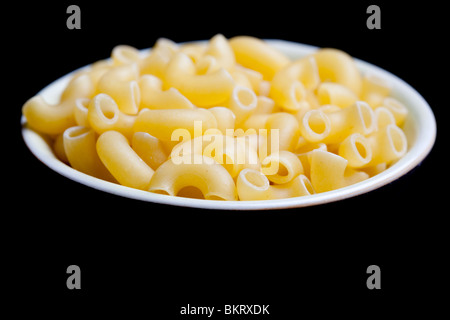 Dried macaroni pasta in a small bowl Stock Photo - Alamy