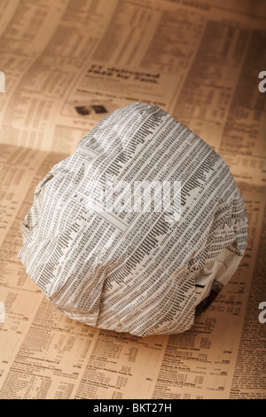 scrunched ball of newspaper Stock Photo: 22706528 - Alamy