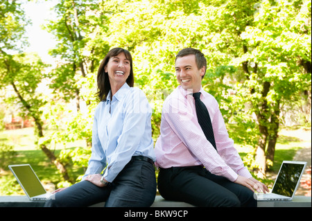 Business colleagues laughing Stock Photo - Alamy