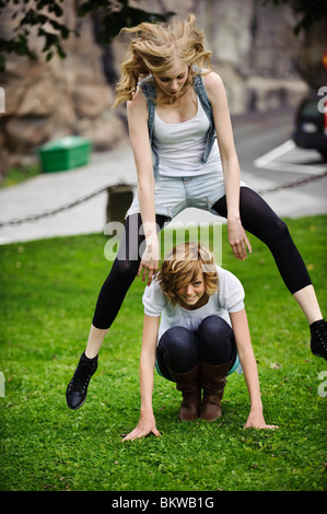 Two girls playing with each other Stock Photo: 27319683 - Alamy