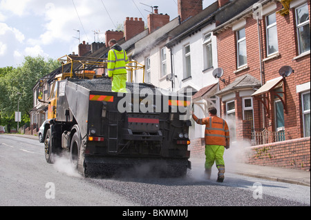 Road resurfacing using a preservation treatment Surface Dressing of ...