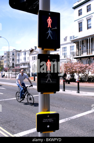 Pedestrian Puffin Crossing with traffic light on green with pedestrian ...