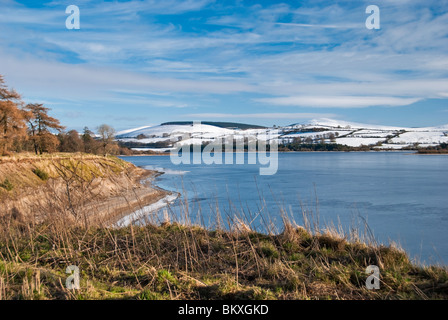 Looking across the ice covered Poulaphouca Reservoir in County Wicklow ...