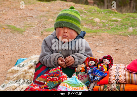 Peruvian Boy In Traditional Dress Playing A Wooden Flute Stock Photo ...