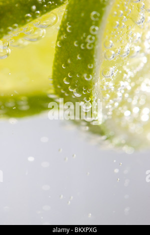 citrus slices floating in water Stock Photo - Alamy