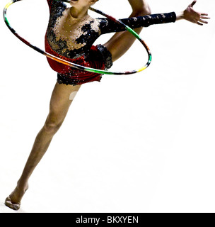 Female rhythmic gymnast performing with hoop Stock Photo - Alamy