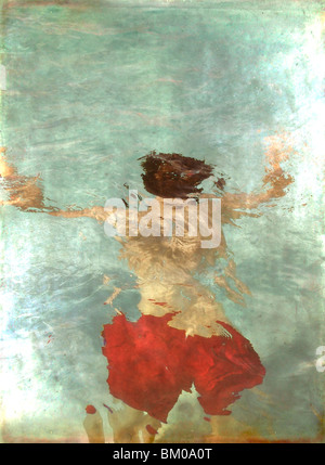 boy floating face down in swimming pool Stock Photo - Alamy