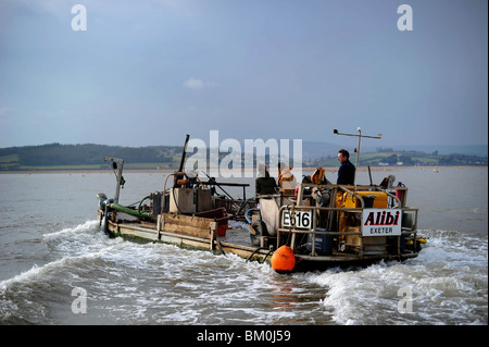 myles blood smyth of the Exmouth Mussel Company pictured on a mussel ...