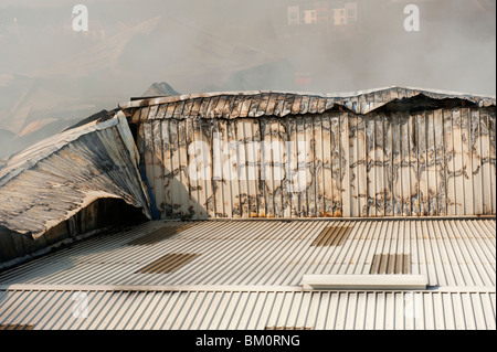 Factory warehouse fire collapsed steel wall cladding Stock Photo - Alamy