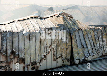 Factory warehouse fire collapsed steel wall cladding Stock Photo - Alamy