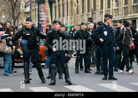 Riot policemen arrest an anti-government protester, during a protest in ...