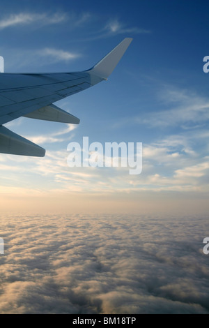 A right side view of aircraft in flight over the pyramids during ...